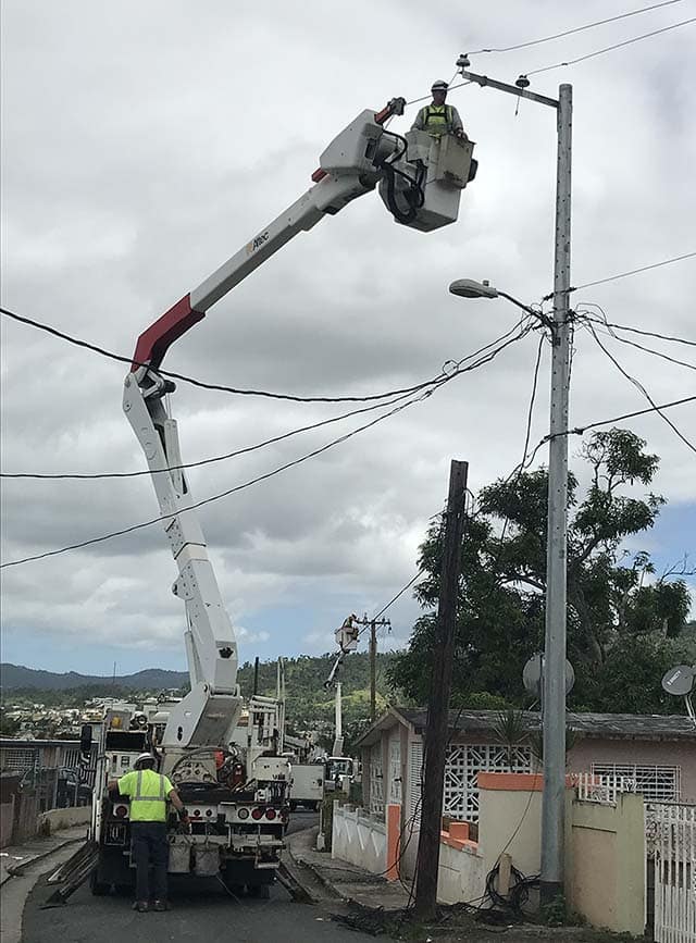 Puerto Rican residents cheer on PPL workers for restoration work